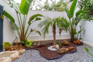 Apartamento Superior | Sala de estar | Televisor 