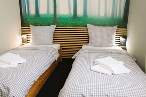 Apartamento | Wi-Fi de cortesia, roupa de cama