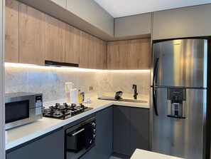 Apartamento | 2 quartos, escrivaninha, ferros/tábuas de passar roupa