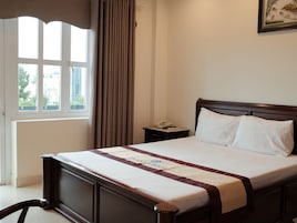 Quarto Superior | Roupa de alta qualidade, minibar, secretária