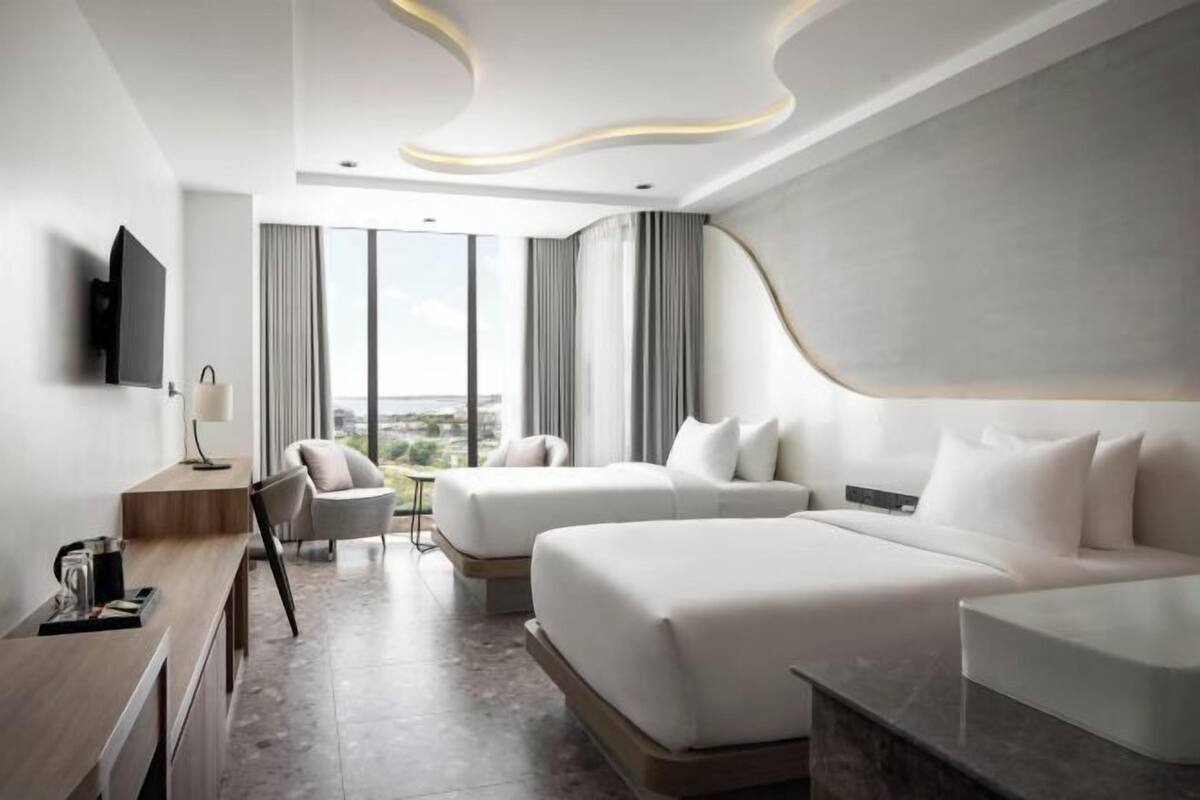 1 quarto, roupa de alta qualidade, camas de colchão pillowtop, minibar