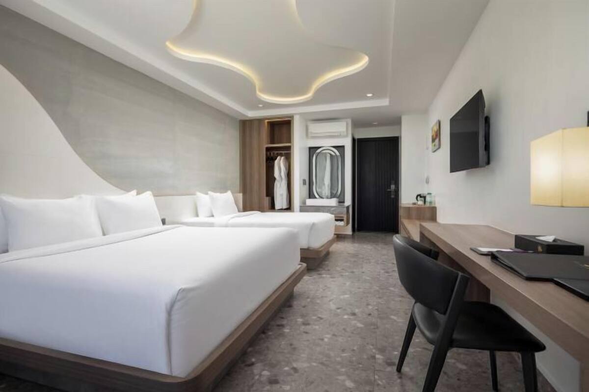 1 quarto, roupa de alta qualidade, camas de colchão pillowtop, minibar