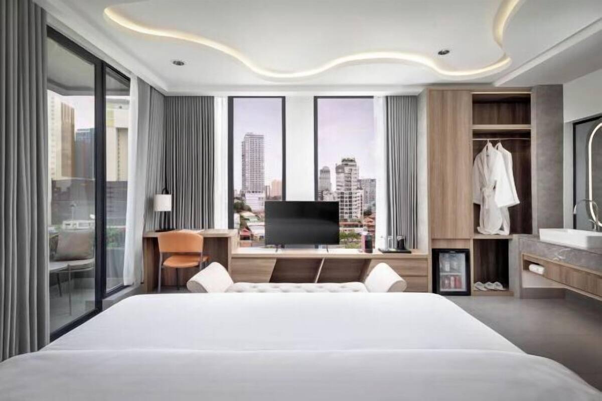 1 quarto, roupa de alta qualidade, camas de colchão pillowtop, minibar