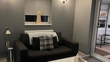 Apartamento | Sala de estar | Televisor