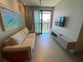 Apartamento | Área de estar | TV