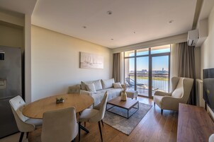 Apartamento, 1 quarto, vista para o rio | Área de estar | TV LED