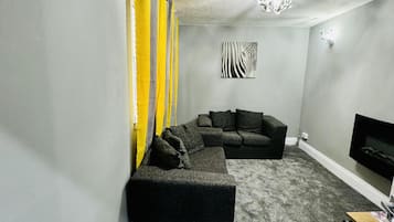 Casa | Sala de estar | Televisor, lareira