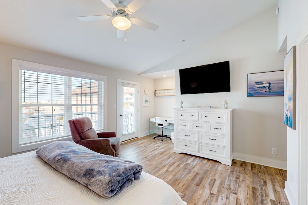 Upscale canal-front townhome with pool, beach access, dock, balconies ...