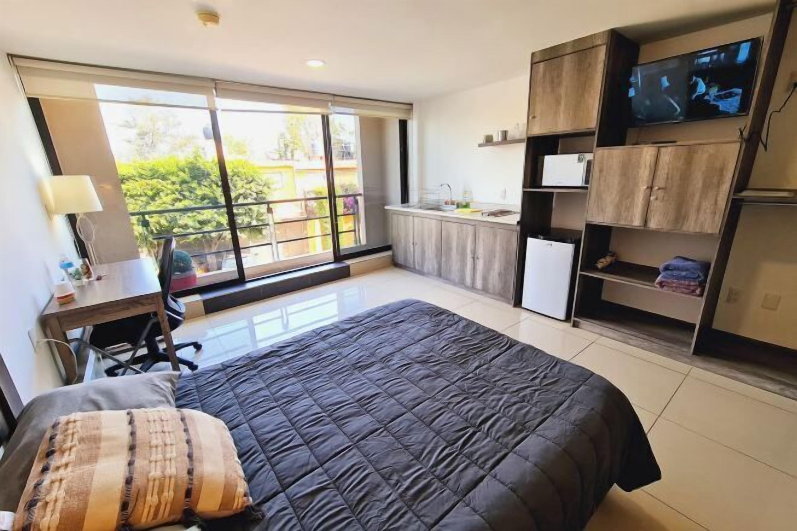 Roupas de cama premium, edredons de pluma, cofres nos quartos