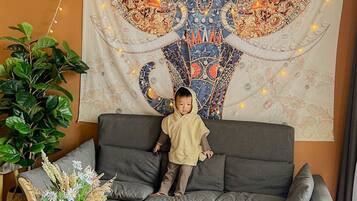 Quarto Twin Panorâmico | Sala de estar | Lareira