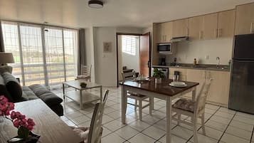 Loft Deluxe, cozinha | Edredões de penas, com decoração personalizada