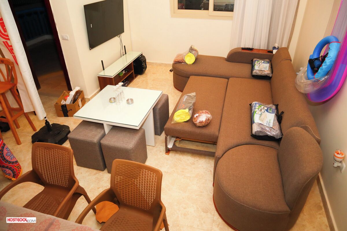 Chalé Superior, 1 quarto, varanda, junto à praia | Sala de estar | Smart TV de 55 polegadas com canais via satélite 