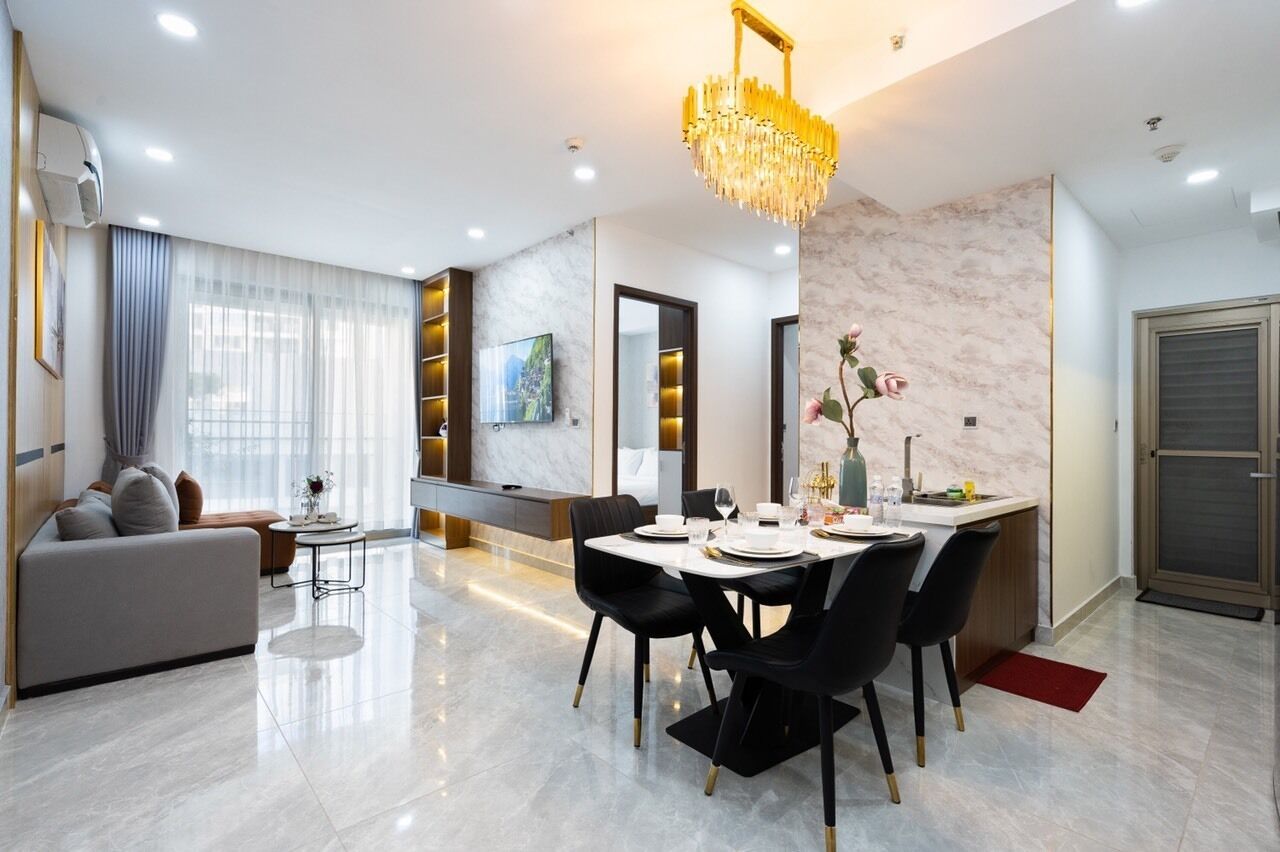 Apartamento luxo, 2 quartos | Área de estar