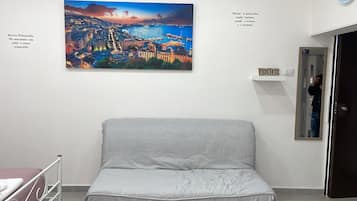 Quarto quádruplo standard | Wi-Fi de cortesia, roupa de cama