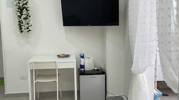 Quarto quádruplo standard | Wi-Fi de cortesia, roupa de cama