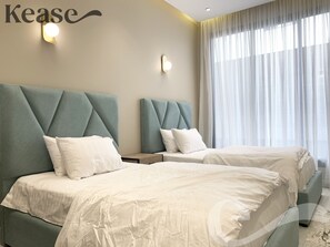 Apartamento Design, 3 quartos | 3 quartos, cortinas/cortinados opacos, ferro/tábua de engomar 