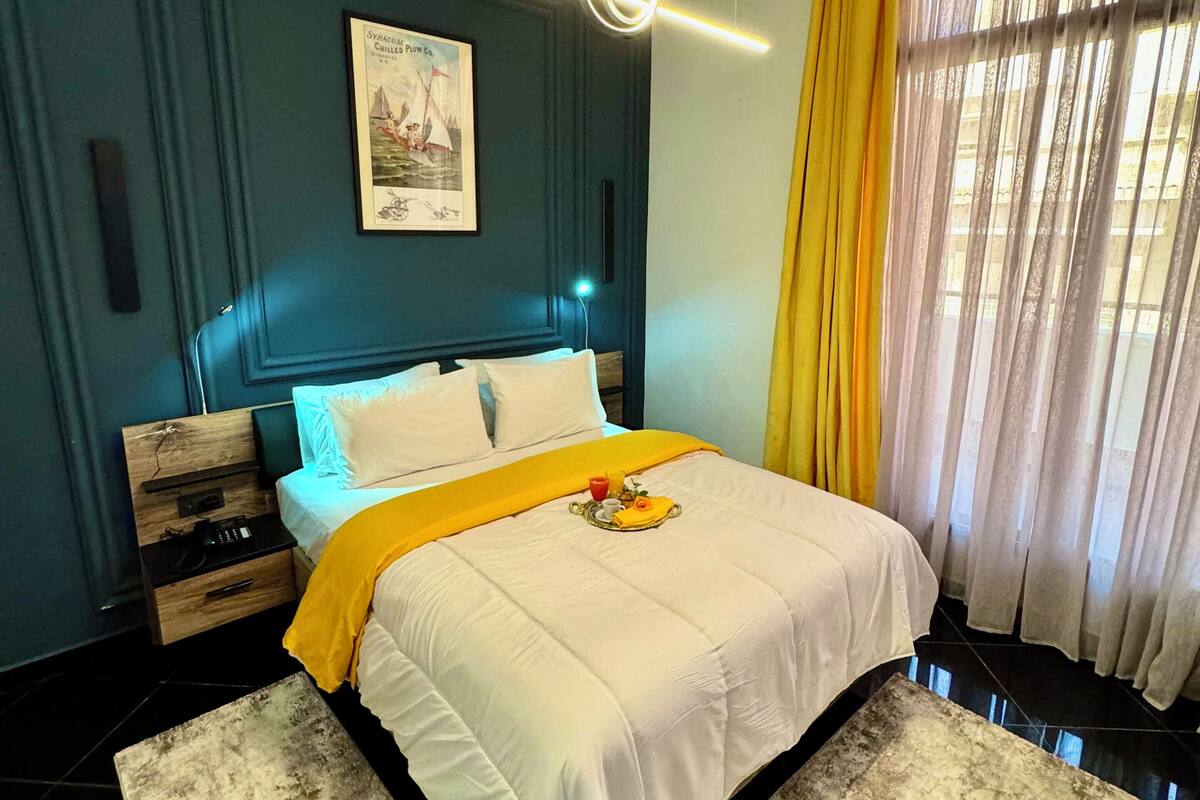 Quarto Deluxe, vários quartos, Vista para a cidade, na torre | Lençóis de algodão egípcio, roupa de alta qualidade