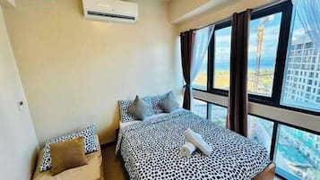 Condo luxo, 2 quartos, vista para a praia | 2 quartos, espaço de trabalho para notebook