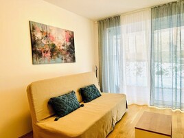 Suíte estúdio família, sacada, vista para o pátio | Roupas de cama antialérgicas, individualmente decorados