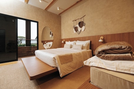 Suíte estúdio premium | Wi-Fi de cortesia, roupa de cama. Villa Nova Hotel