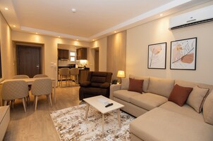 Apartamento superior | Área de estar | Smart TV 40 polegadas com canais digitais