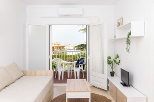 Apartamento, 1 quarto | Sala de estar