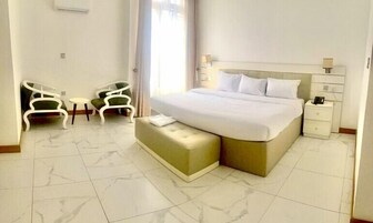 Suite Presidencial, 1 cama king-size | Roupa de alta qualidade, edredões de penas, cortinas/cortinados opacos 