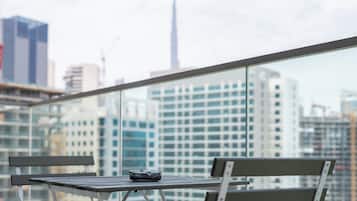 Apartamento Deluxe, varanda, Vista para a cidade | Varanda