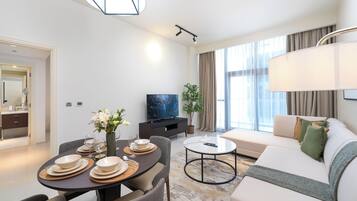 Apartamento Deluxe, varanda, Vista para a cidade | Sala de jantar