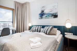 Apartamento, 1 quarto, varanda | 1 quarto, secretária adequada para computadores portáteis 