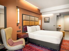 Quarto família, vista para o mar | Roupas de cama premium, frigobar, espaço de trabalho para notebook