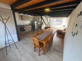 Duplex família | Área de estar | Smart TV 32 polegadas com canais a cabo