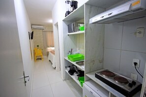 Quarto Comfort, vista para a praia | Cozinha privada
