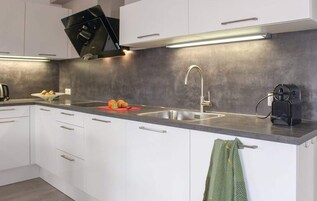 Casa | Cozinha privada | Uma cadeira de bebé 