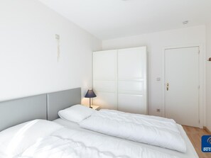 Apartamento | 2 quartos, individualmente mobiliados, ferros/tábuas de passar roupa