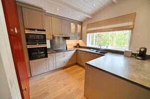 Casa | Cozinha privada | Geladeira, cadeirão de bebê