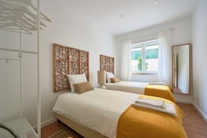 Apartamento 2 quartos | 2 quartos, Wi-Fi de cortesia, roupa de cama