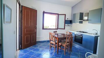 Bungalow Comfort, pátio, vista para o jardim | Cozinha privada
