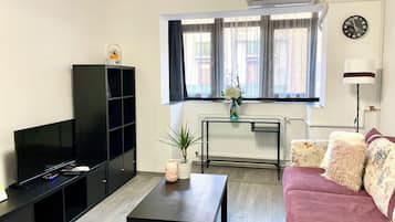 Apartamento urbano | Área de estar | TV LED