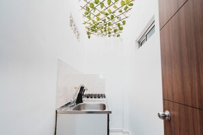 Quarto casal luxo | Cozinha privada | Micro-ondas em uma área comum