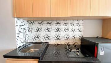 Estúdio | Cozinha privada | Geladeira, cooktop, chaleira elétrica