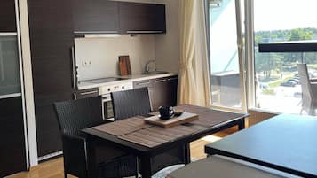 Apartamento, várias camas, não fumadores, kitchenette | Sala de estar