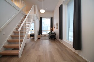 Apartamento Standard | Sala de estar | Televisor de 32 polegadas com canais por cabo 