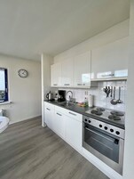 Bungalow, 3 quartos, pátio, vista para o jardim | Cozinha privada