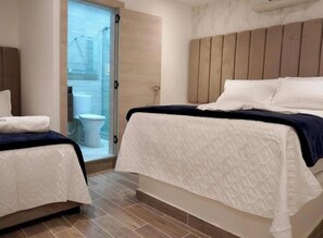 Apartamento Deluxe | Roupa de alta qualidade, edredões de penas, com decoração personalizada 