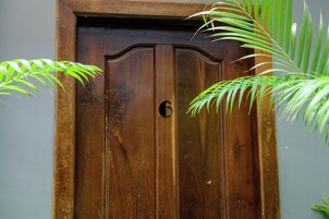 Quarto Duplo Deluxe, vista para o jardim | Terraço/pátio interior