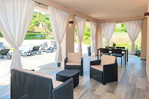 Quarto Quádruplo Deluxe | Terraço/pátio interior