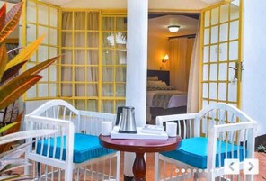 Quarto Duplo Executivo, varanda, vista para o jardim | Varanda