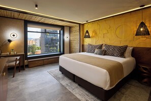 Suite Deluxe | 1 quarto, roupa hipoalergénica, edredões de penas, minibar 