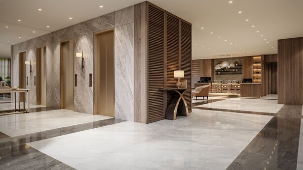 Um hall amplo com piso de mármore, balcão de recepção e cozinha moderna com armários de madeira e iluminação pendente.
